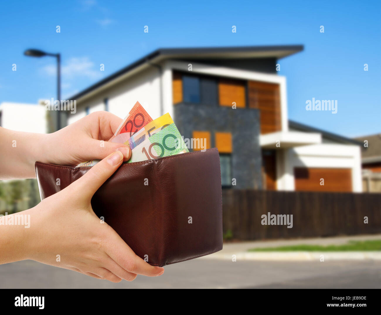 Australian money in wallet on real estate background Stock Photo - Alamy