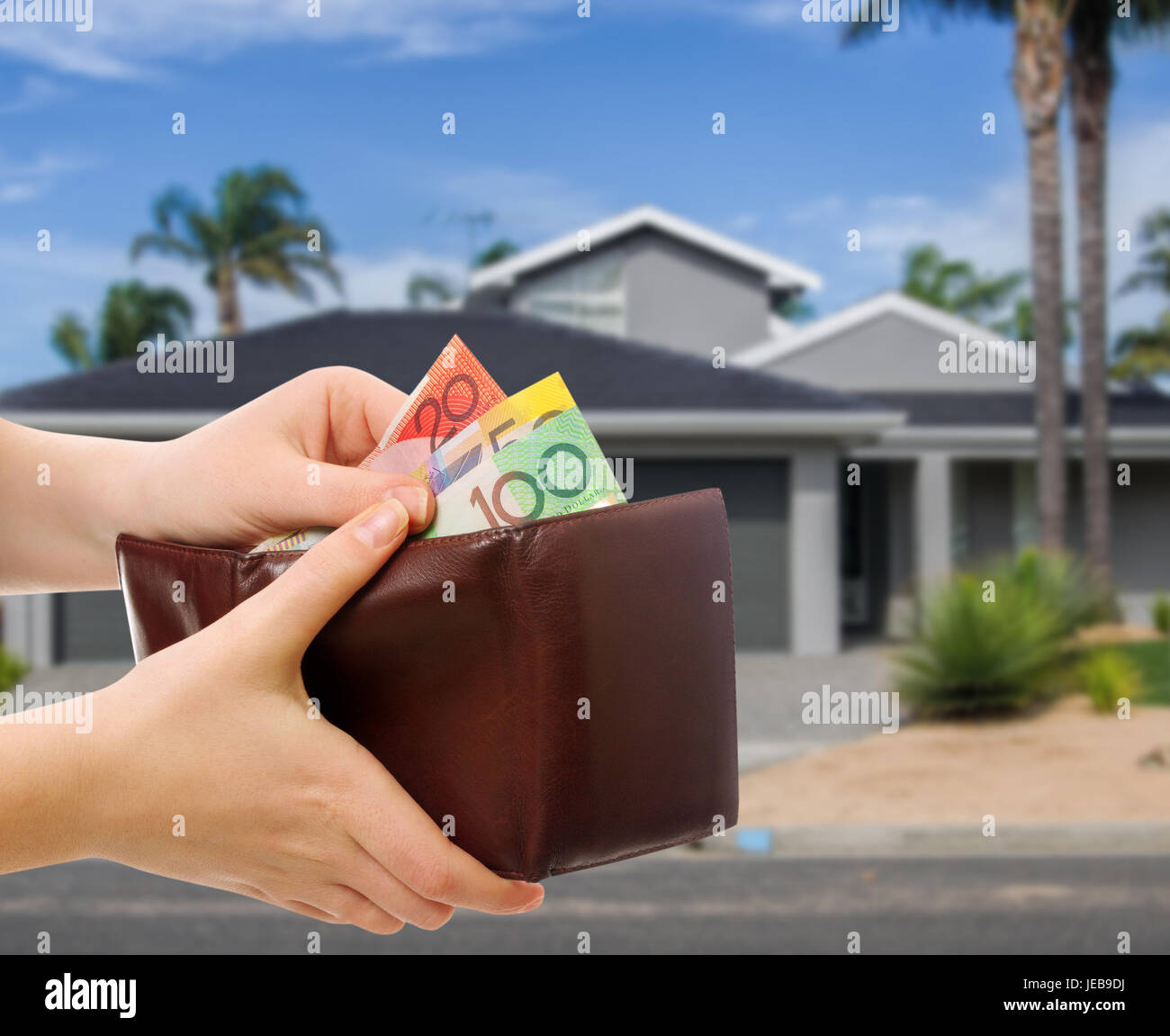 Australian money in wallet on real estate background Stock Photo - Alamy