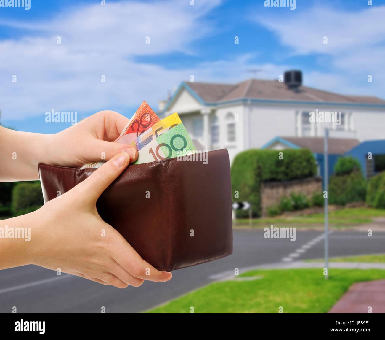 Australian money in wallet on real estate background Stock Photo - Alamy
