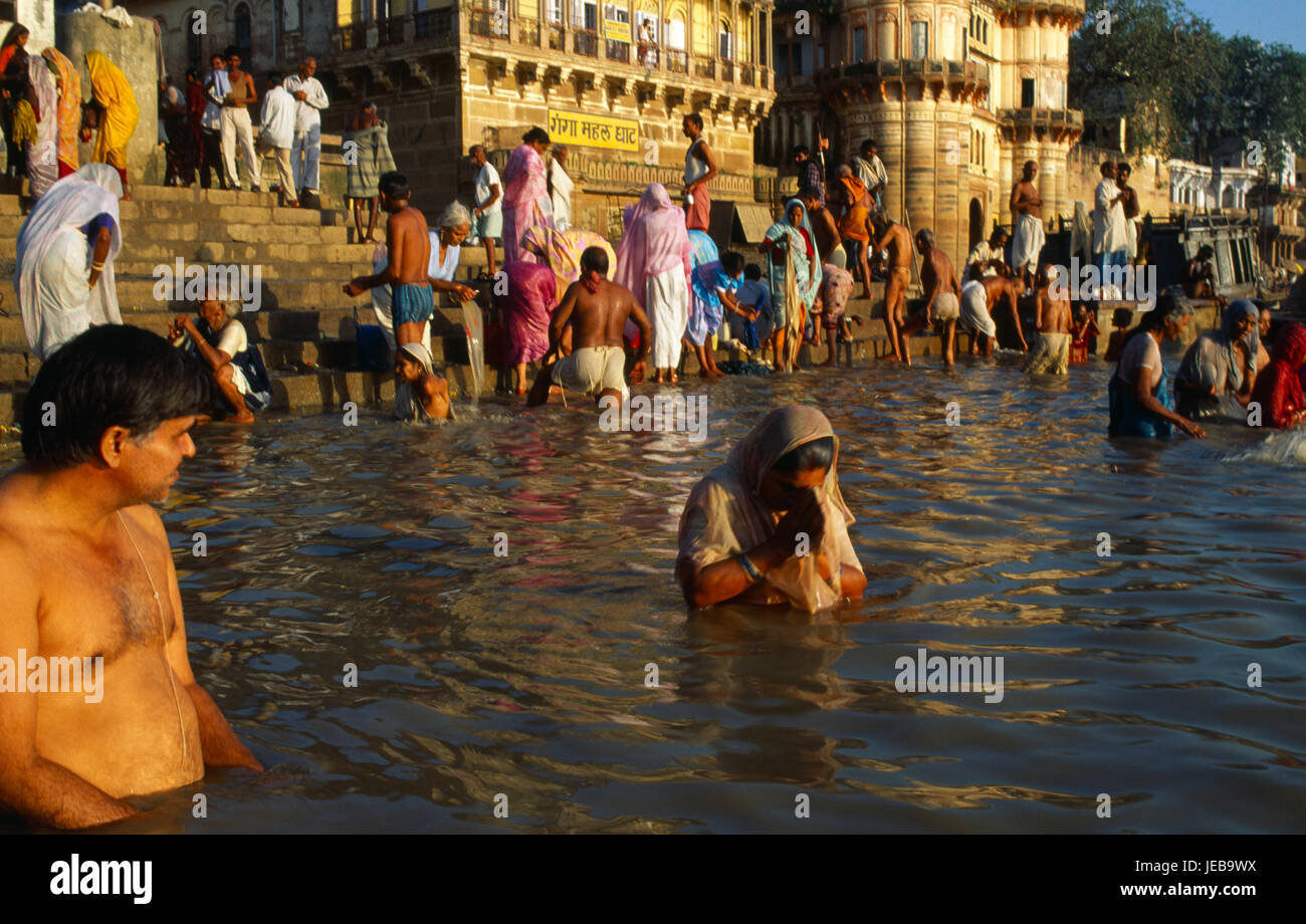 India, Uttar Pradesh, Varanasi, Crowds bathing and praying in the River ...