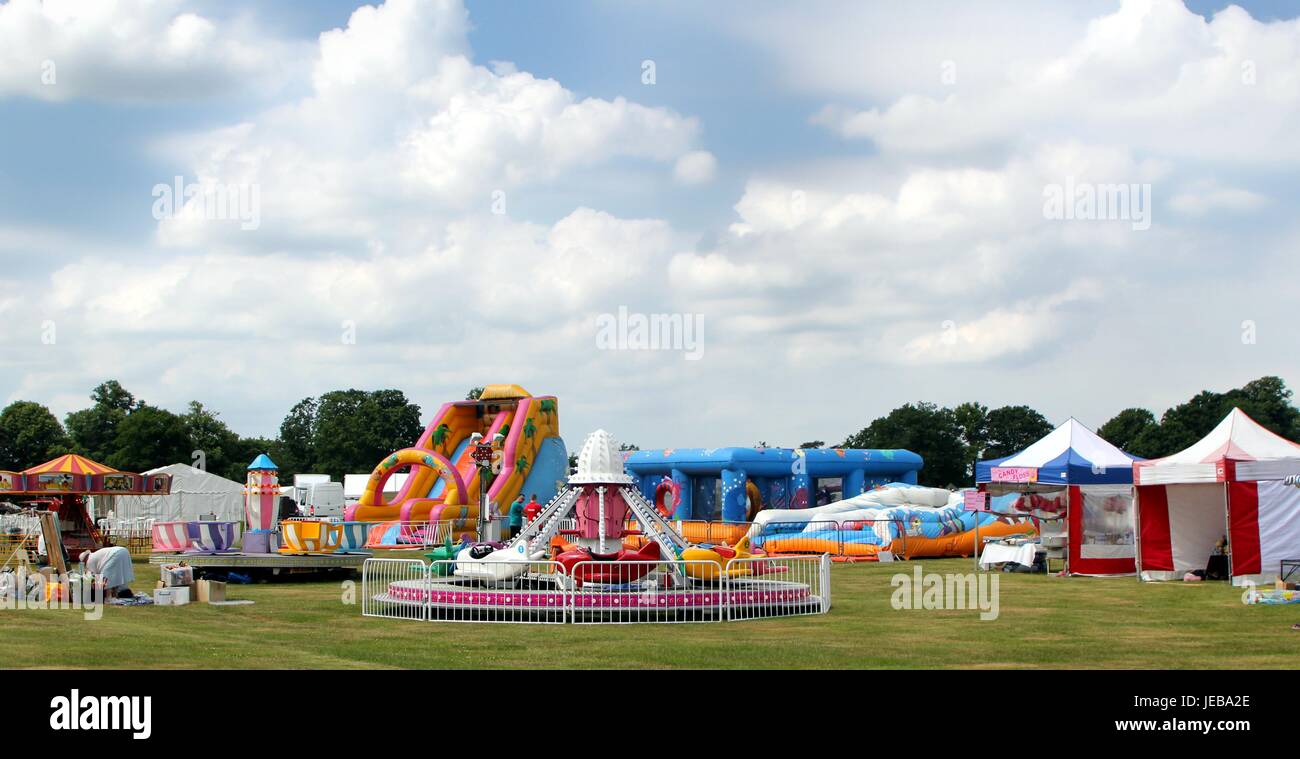 Sandhurst, UK - June 18 2017: Colorful funfair rides and amusements for ...