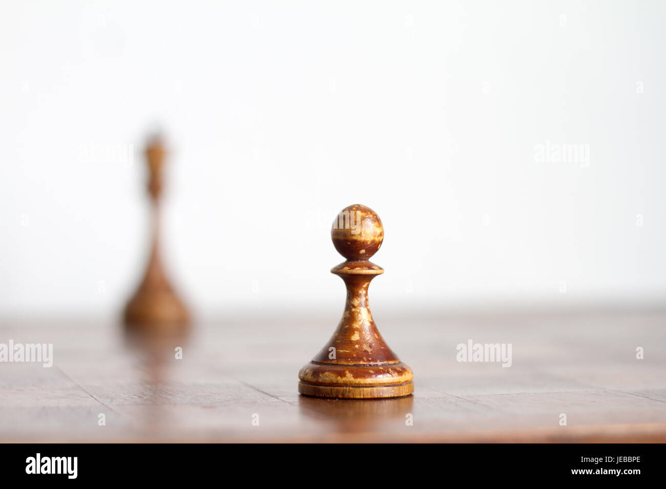 Ancient wooden chess pieces on an old chessboard Stock Photo - Alamy