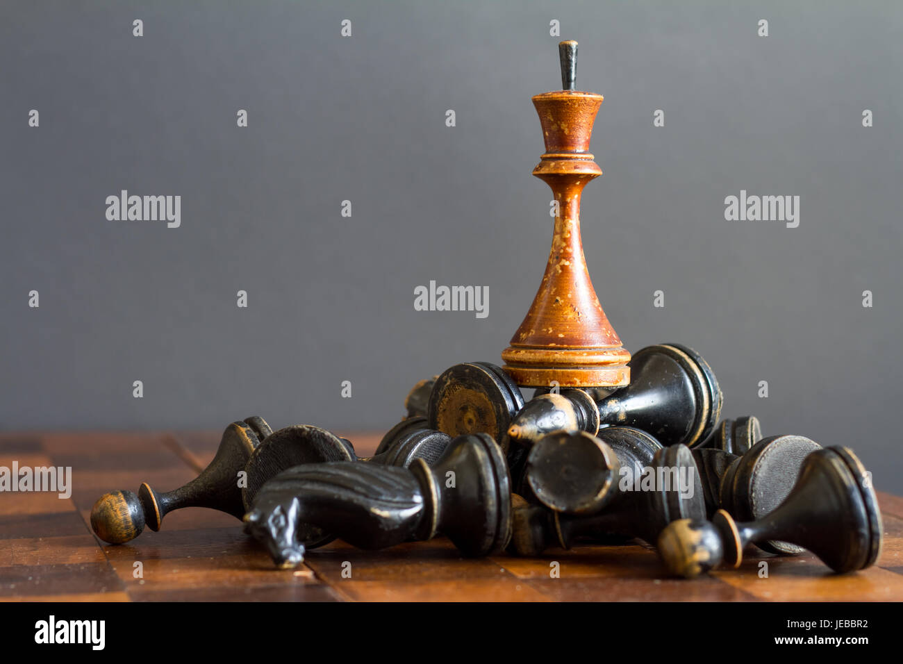 Ancient wooden chess pieces on an old chessboard Stock Photo - Alamy