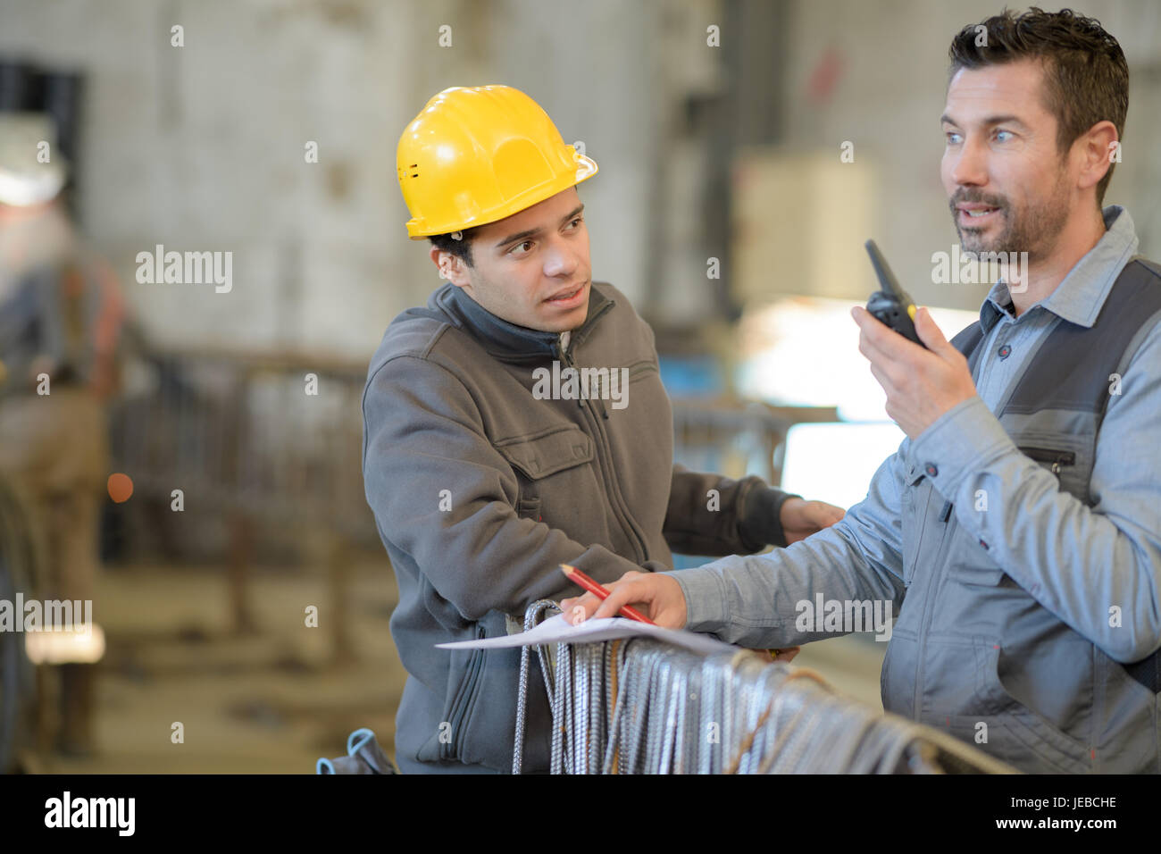 engineers working in power plant talking on the walkie-talkie Stock ...