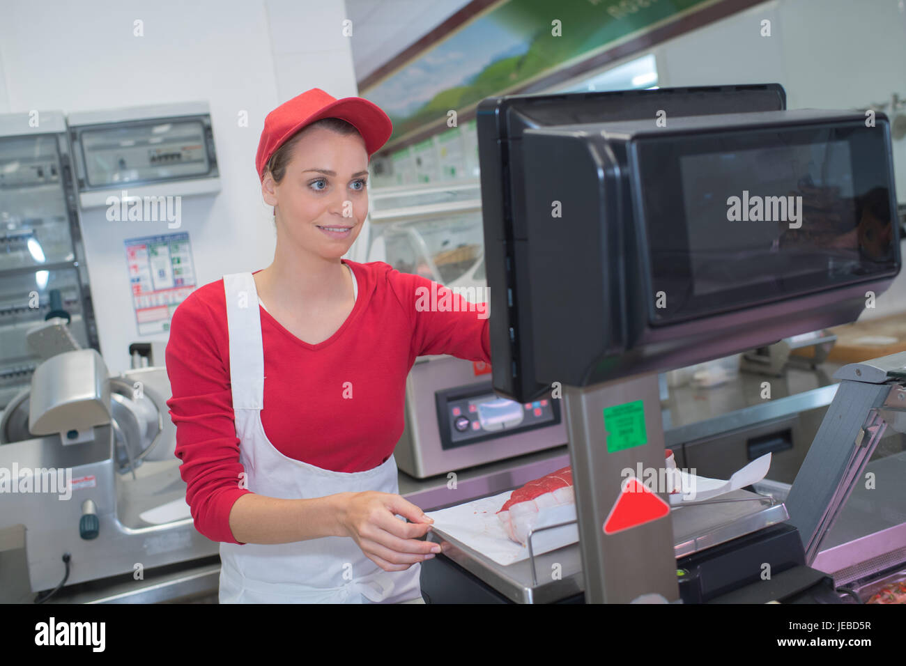 Happy female butcher in slaughterhouse hi-res stock photography and ...
