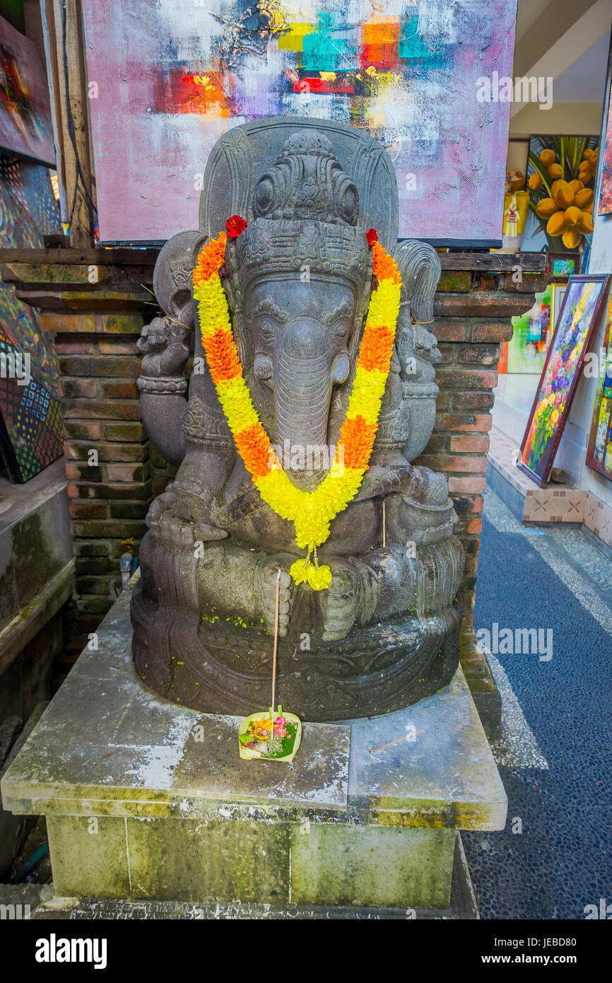 BALI, INDONESIA - MARCH 05, 2017: Stoned elephant statue with a ...