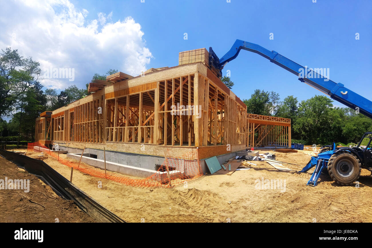 New house construction with frame Stock Photo - Alamy
