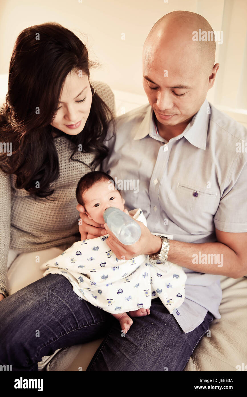 asian parents with newborn Stock Photo - Alamy