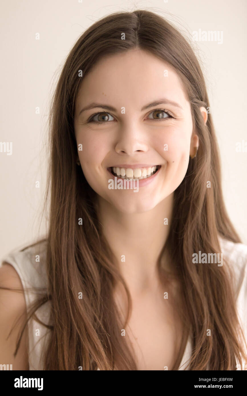 Emotive headshot portrait of happy young woman Stock Photo - Alamy Emotive headshot portrait of happy young woman Stock Photo - Alamy