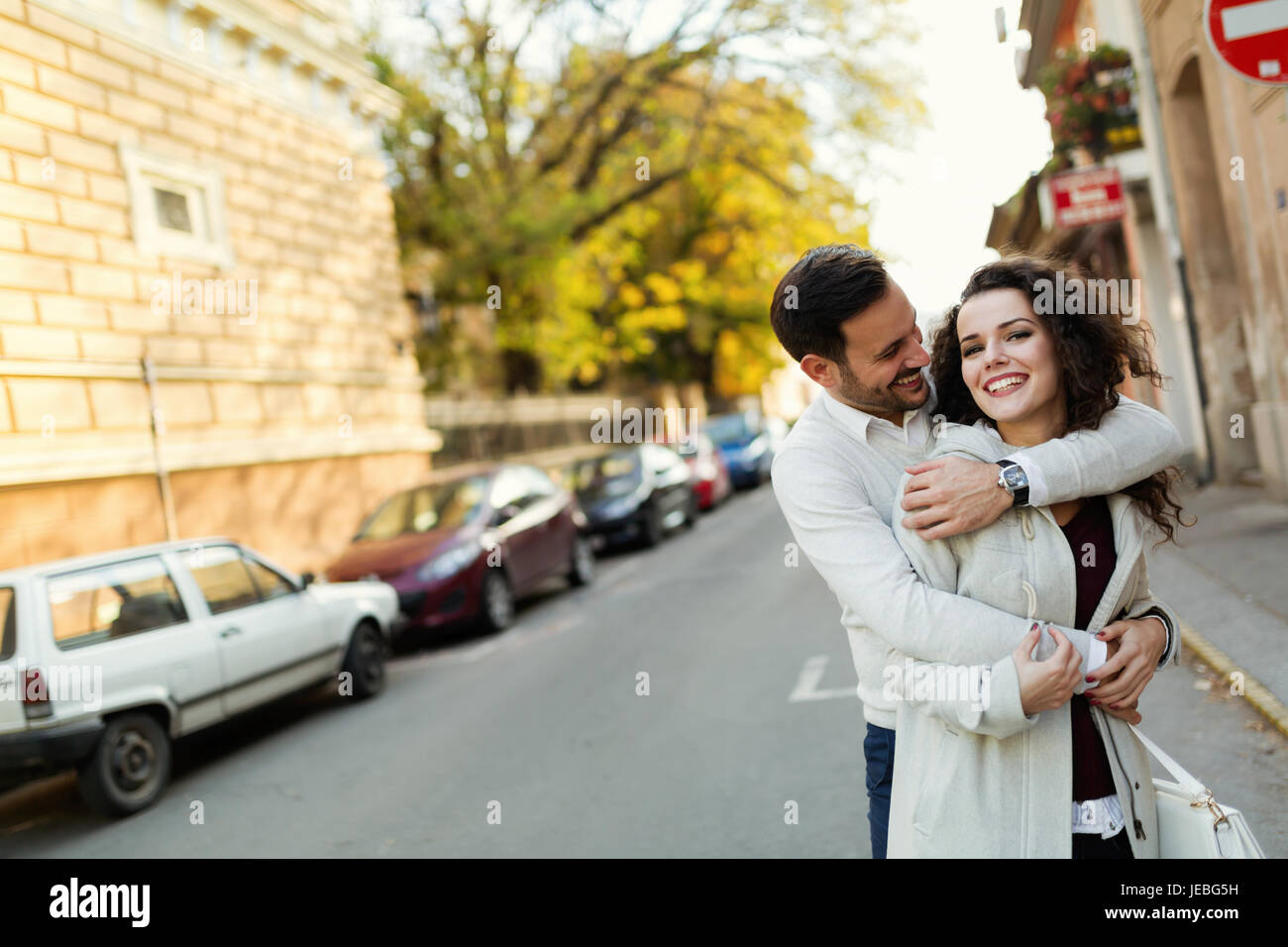 Happy young couple in love spending time together Stock Photo - Alamy