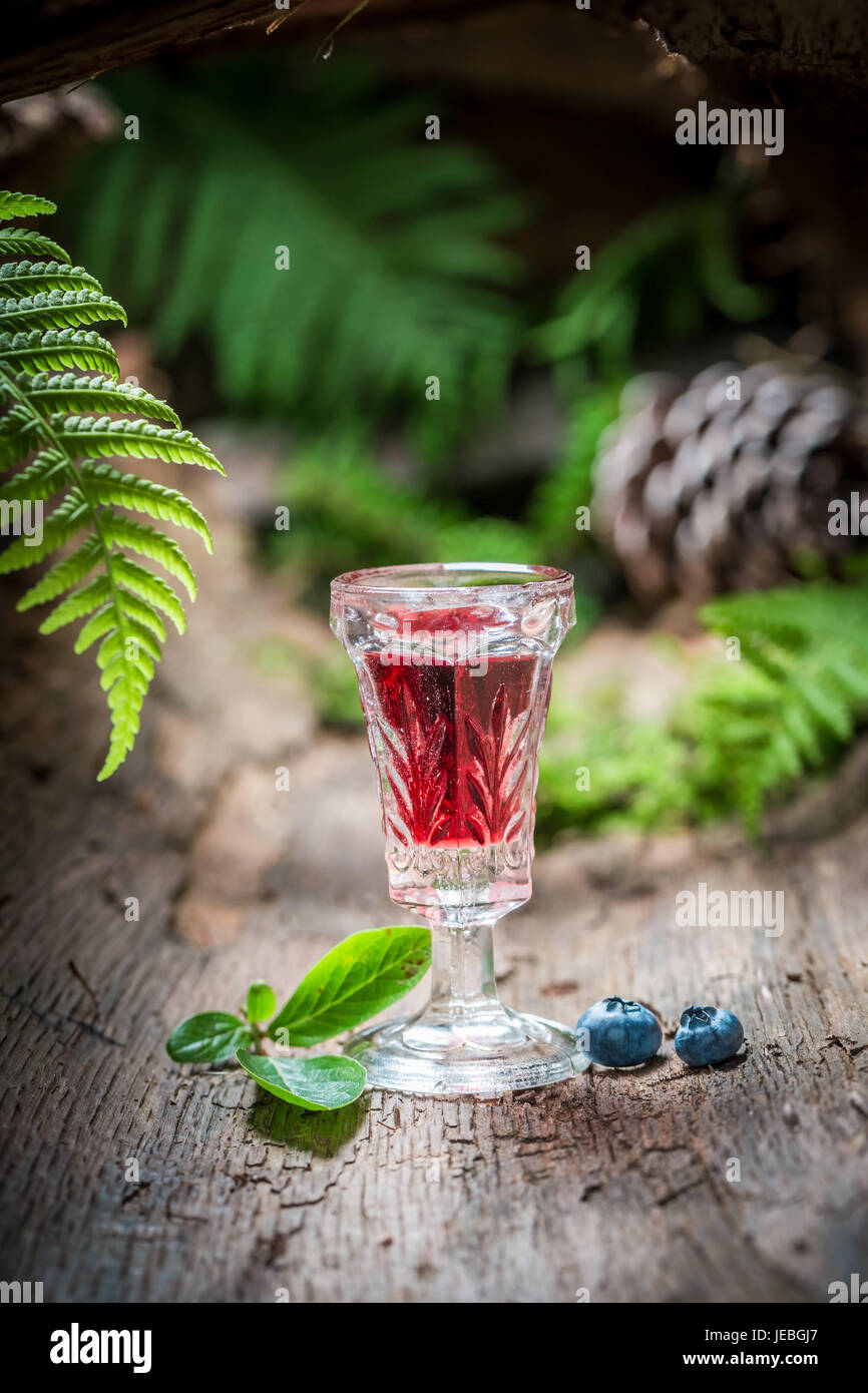 Closeup of liqueur made of blueberries and alcohol Stock Photo - Alamy