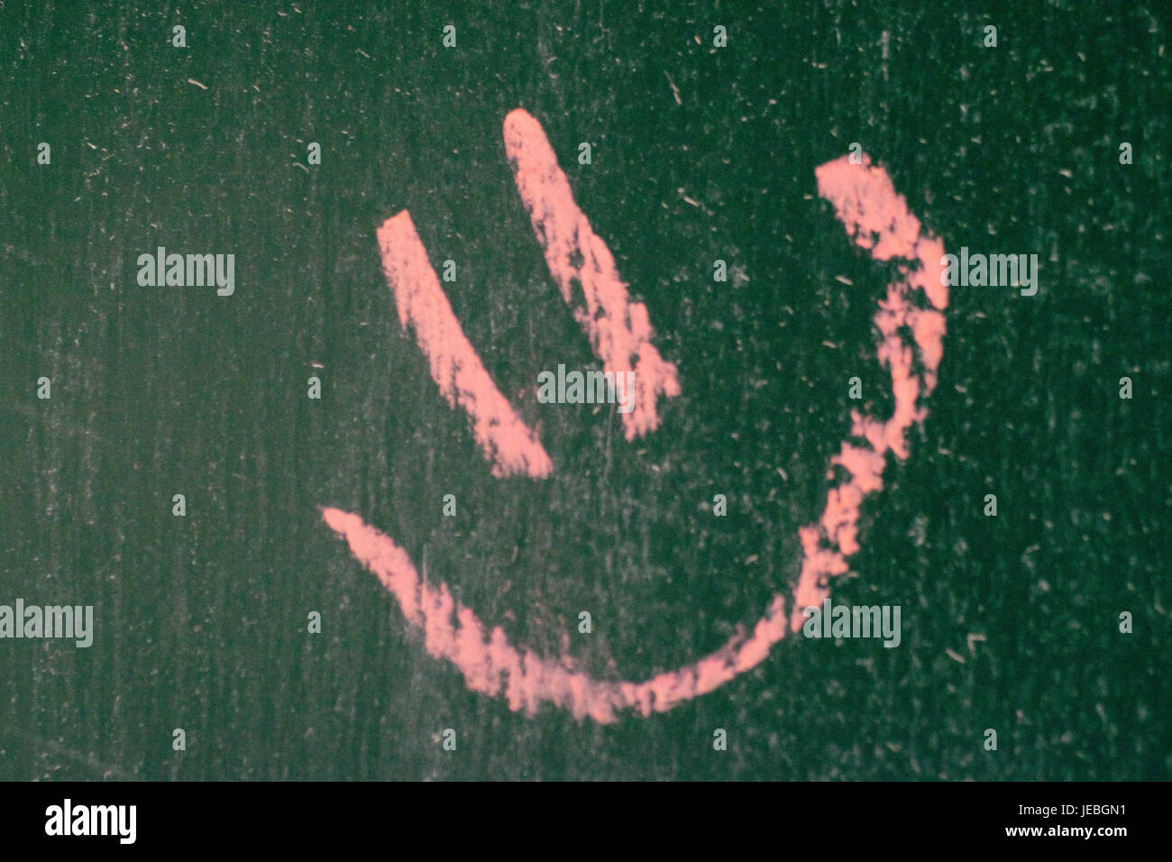 Face cartoon Chalk on blackboard background Stock Photo - Alamy