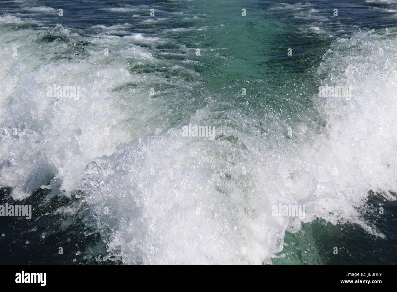 This is a picture of a wave that happens when water meets a boat ...