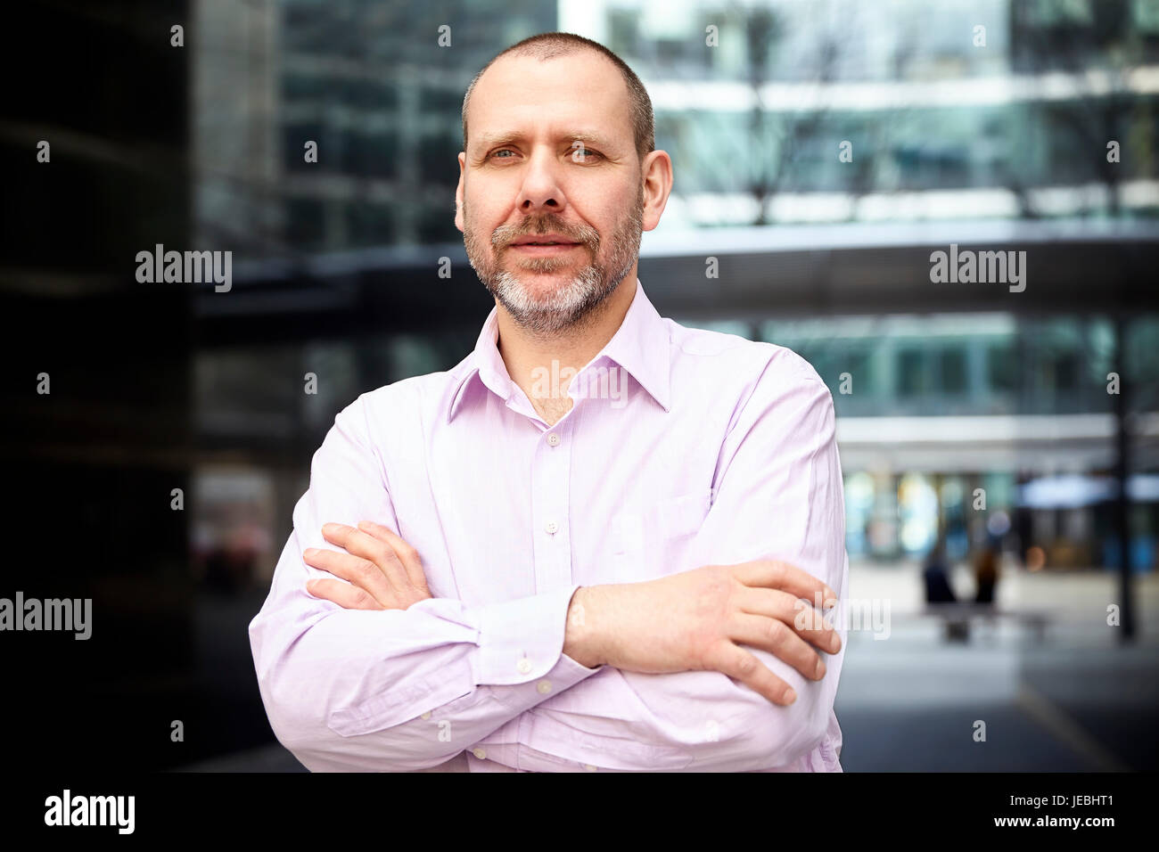 Successful businessman standing hi-res stock photography and images - Alamy