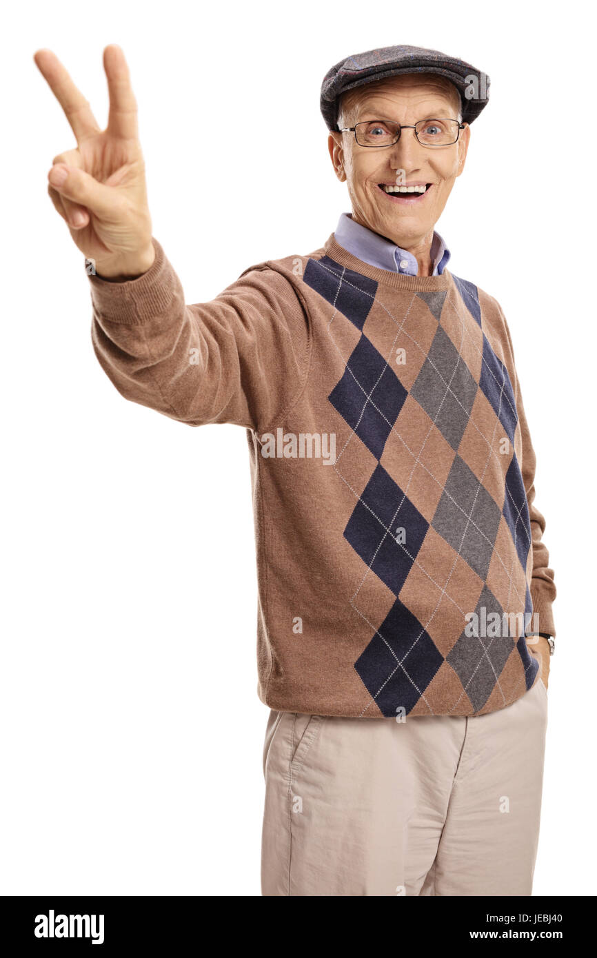 Joyful senior making a victory sign isolated on white background Stock ...