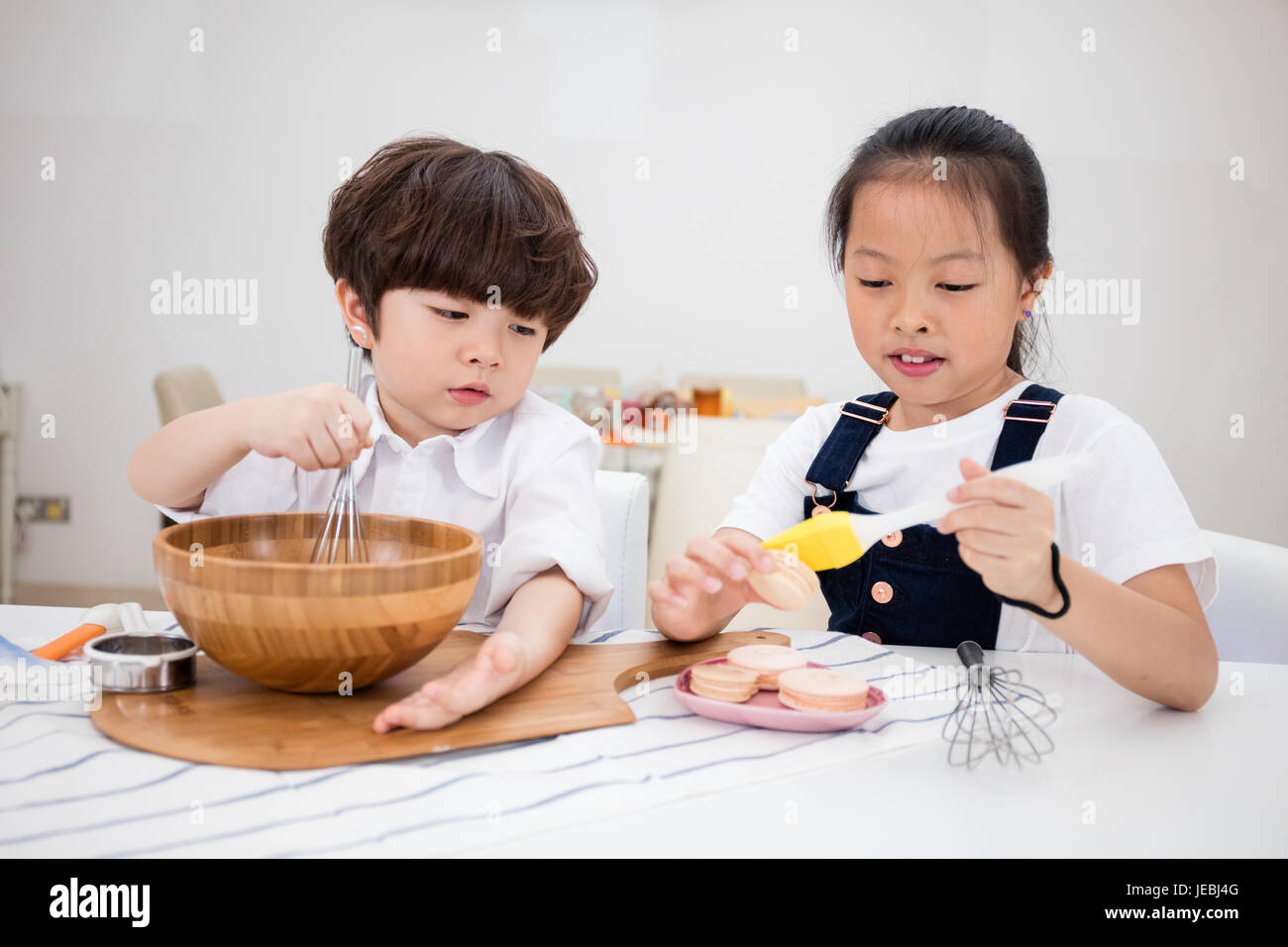 Asian family boy cooking hi-res stock photography and images - Alamy