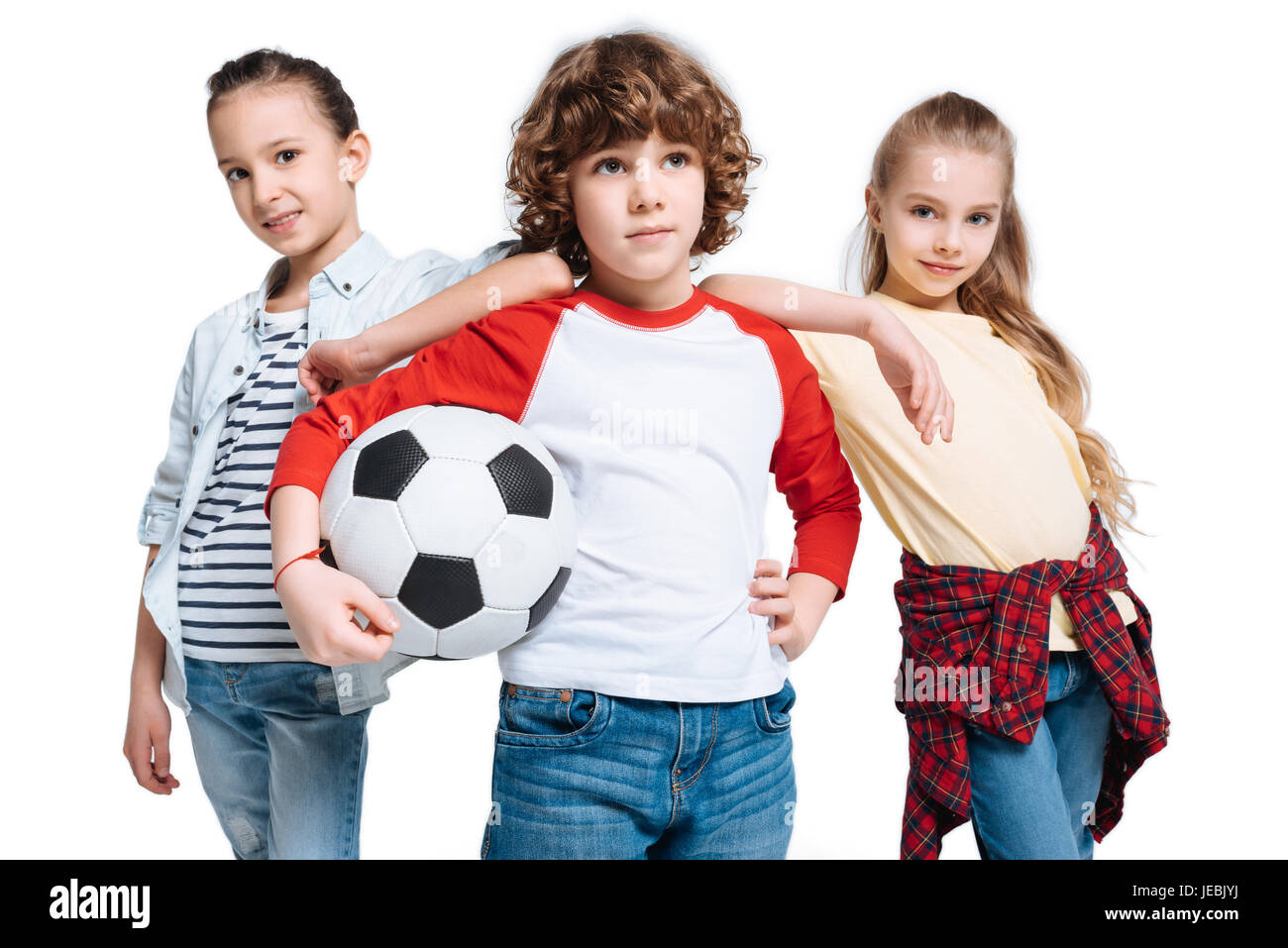 Group of friends playing with soccer ball isolated on white, children ...
