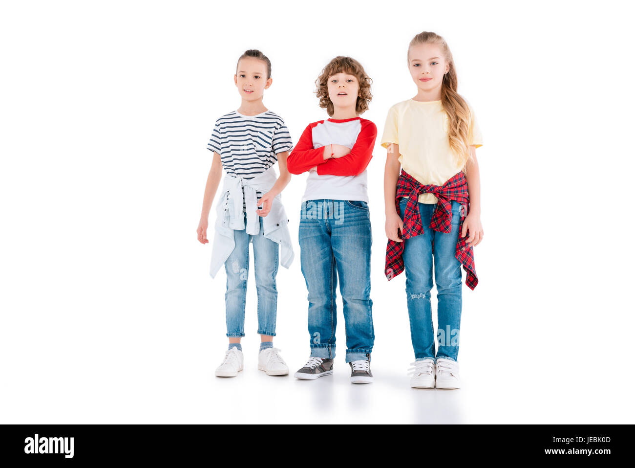 Cute kids standing hi-res stock photography and images - Alamy