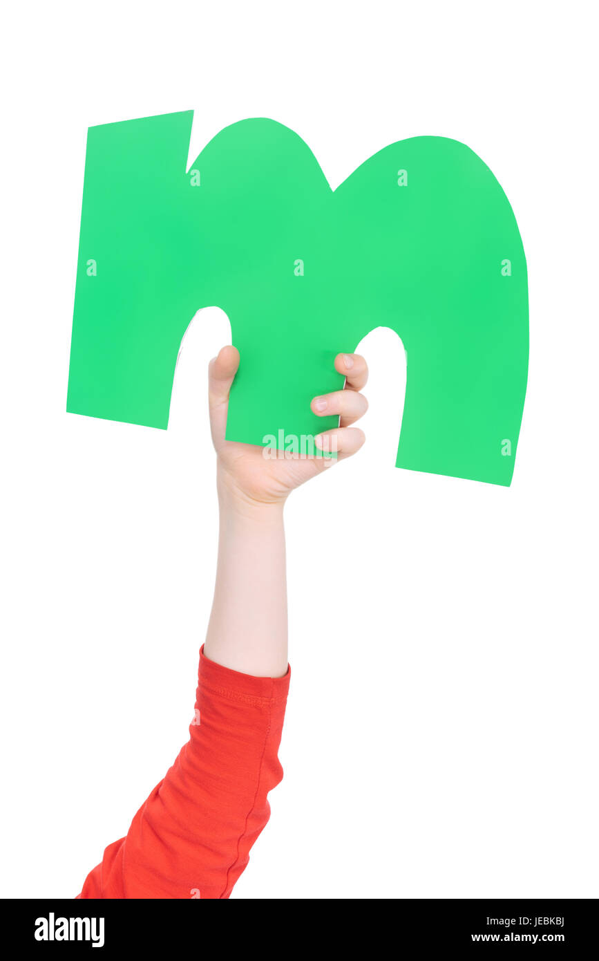 Kid holding colorful alphabet letter M in hand isolated, alphabet ...