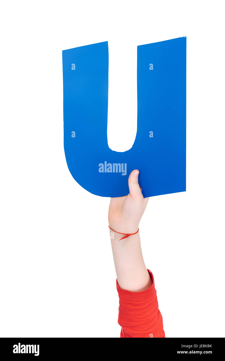 Kid holding colorful alphabet letter U in hand isolated, alphabet ...