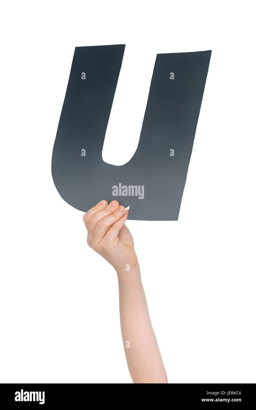 Kid holding colorful alphabet letter U in hand isolated, alphabet ...