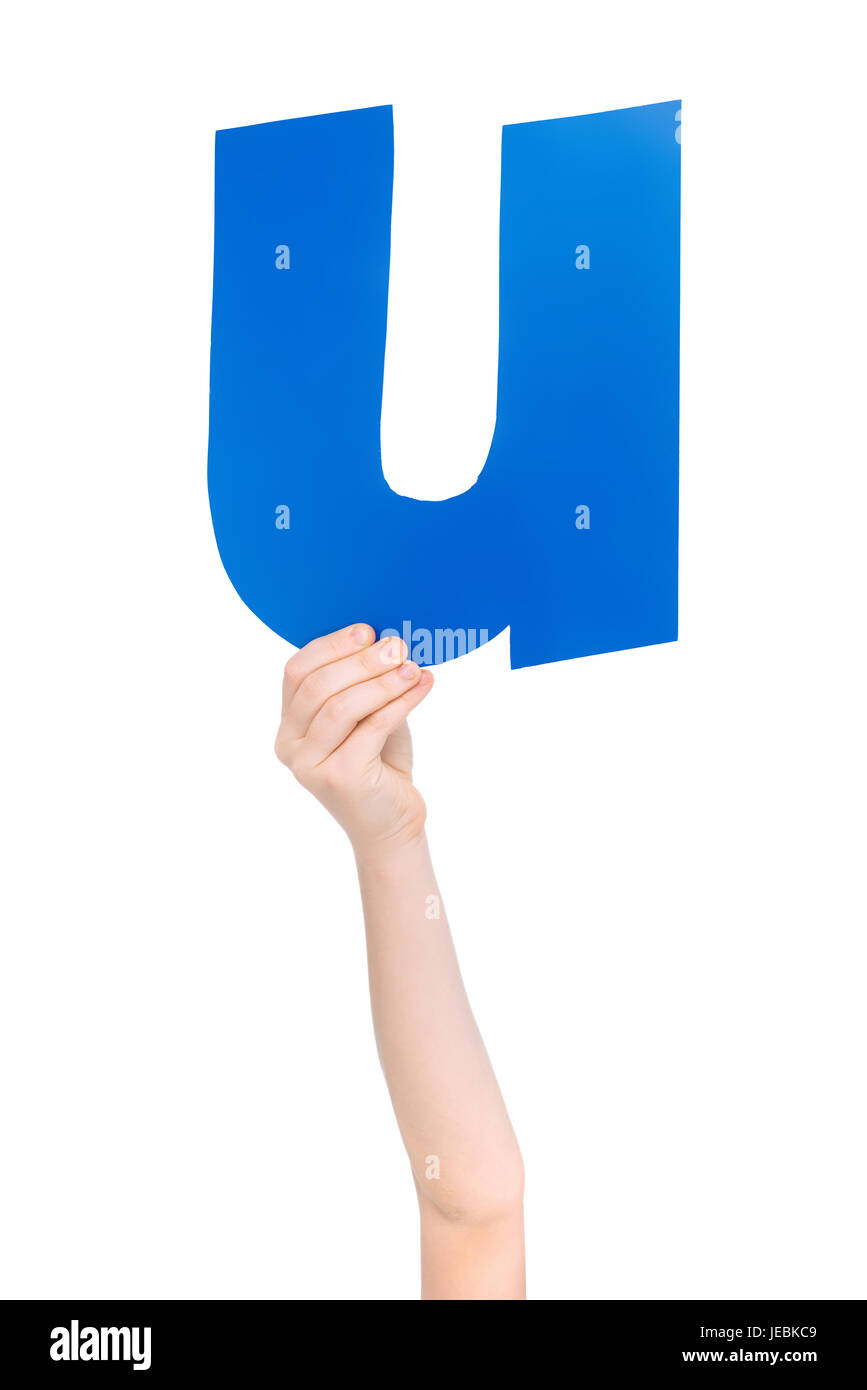 Kid holding colorful alphabet letter U in hand isolated, alphabet ...