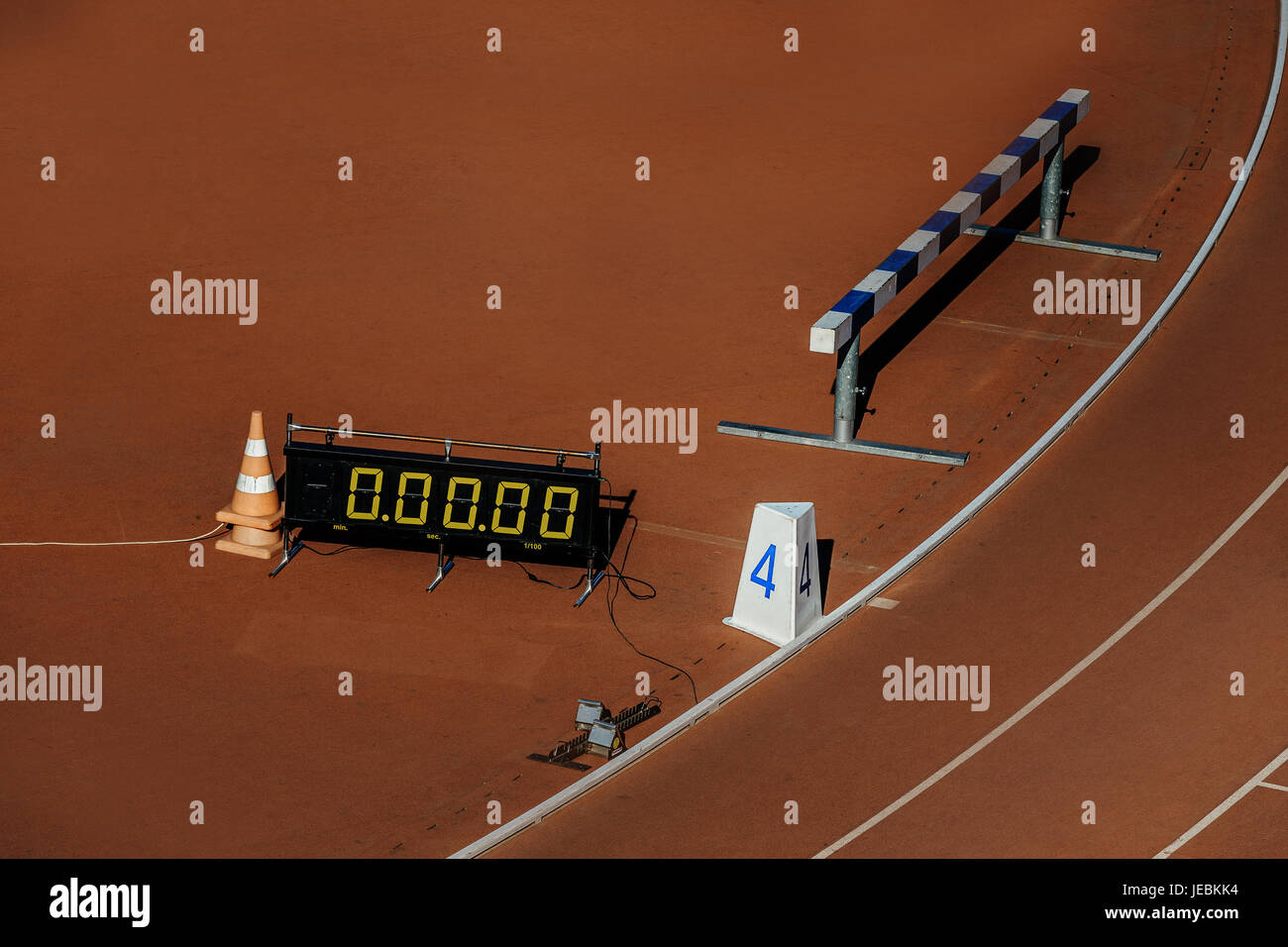 running track stadium with time scoreboard and barrier for steeplechase ...