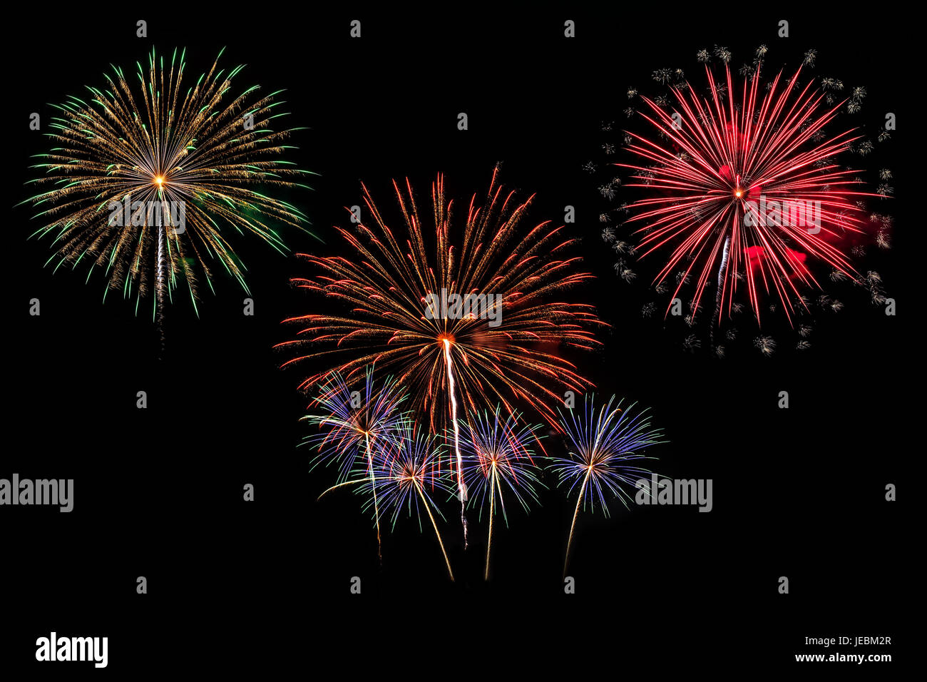 Colorful fireworks of various colors on black background Stock Photo ...
