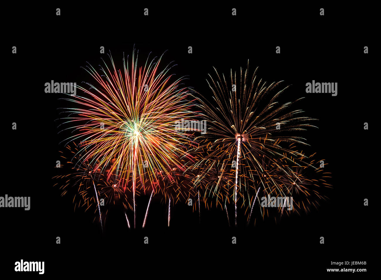 Colorful fireworks of various colors on black background Stock Photo ...