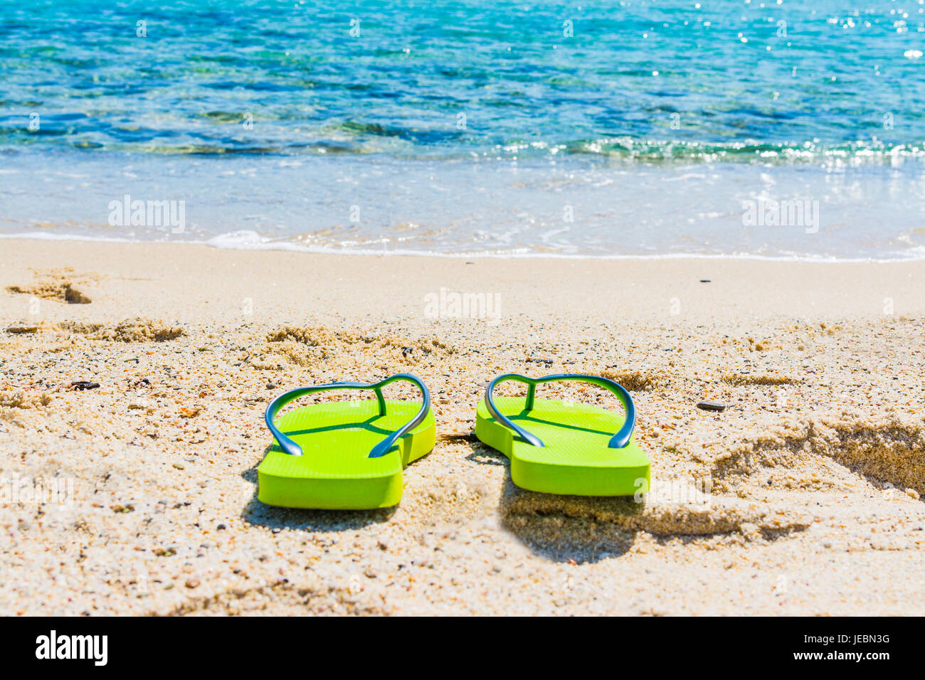 Gold flip flops hi-res stock photography and images - Alamy