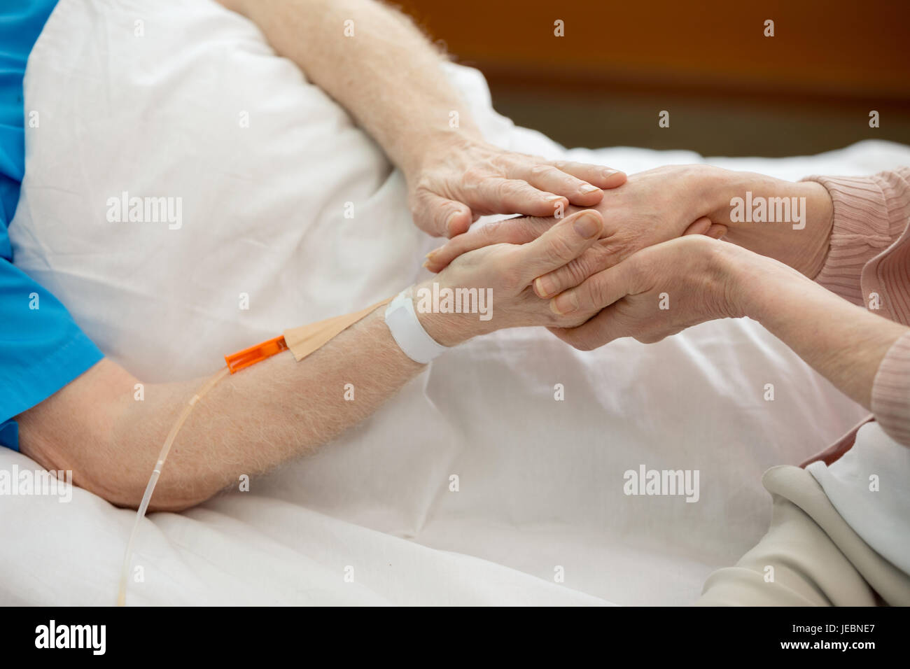 Old man and wife sick in hospital hi-res stock photography and images ...