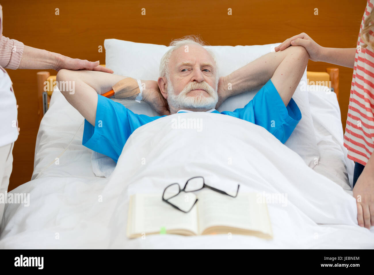 Male patient hospital bed relatives hi-res stock photography and images - Alamy
