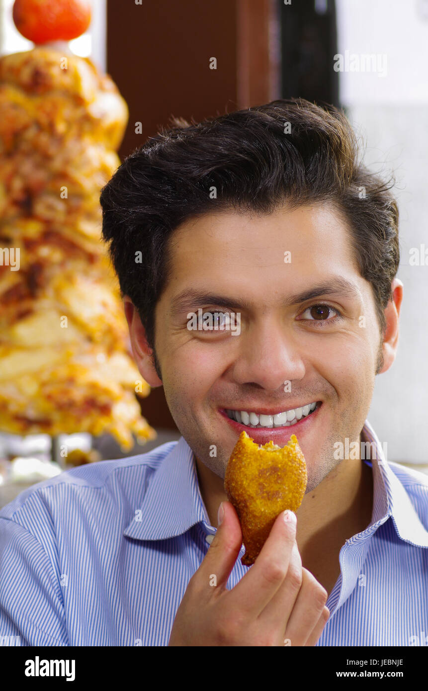 Handsome man eating a delicious turkish food Stock Photo - Alamy