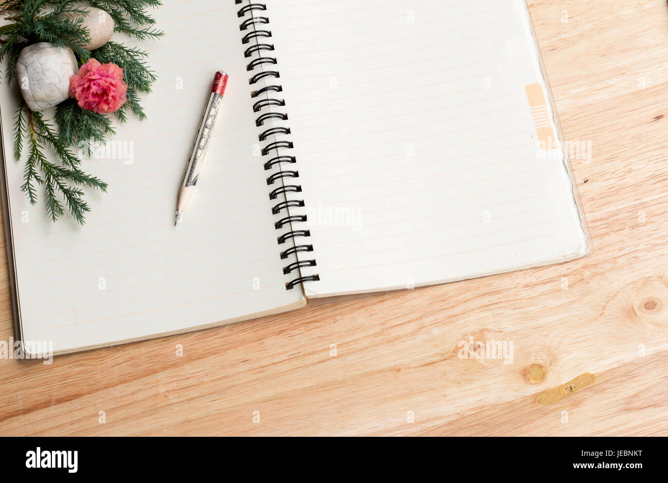 old notebook on wooden floor Stock Photo - Alamy