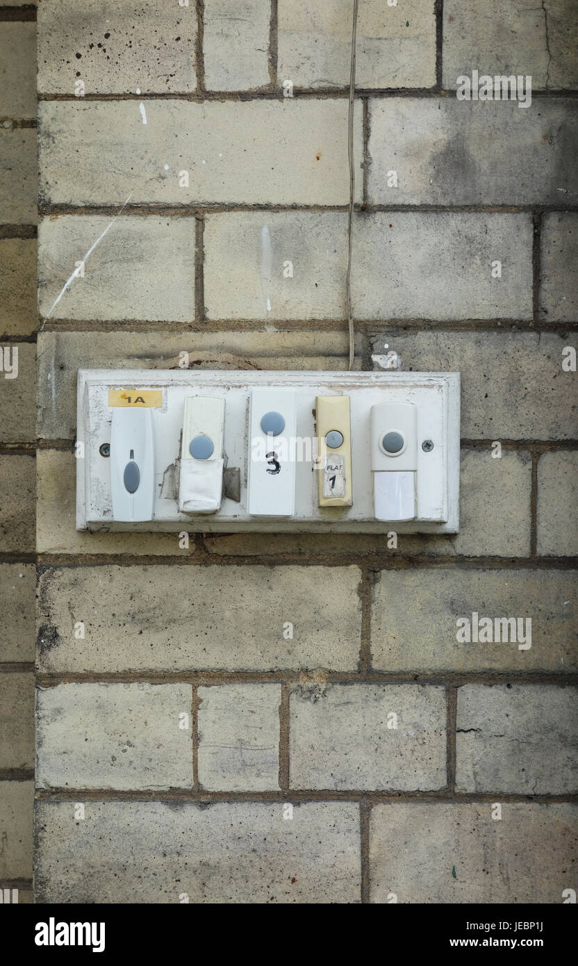Door bells for flats on wall of house on Feversham Crescent, York ...
