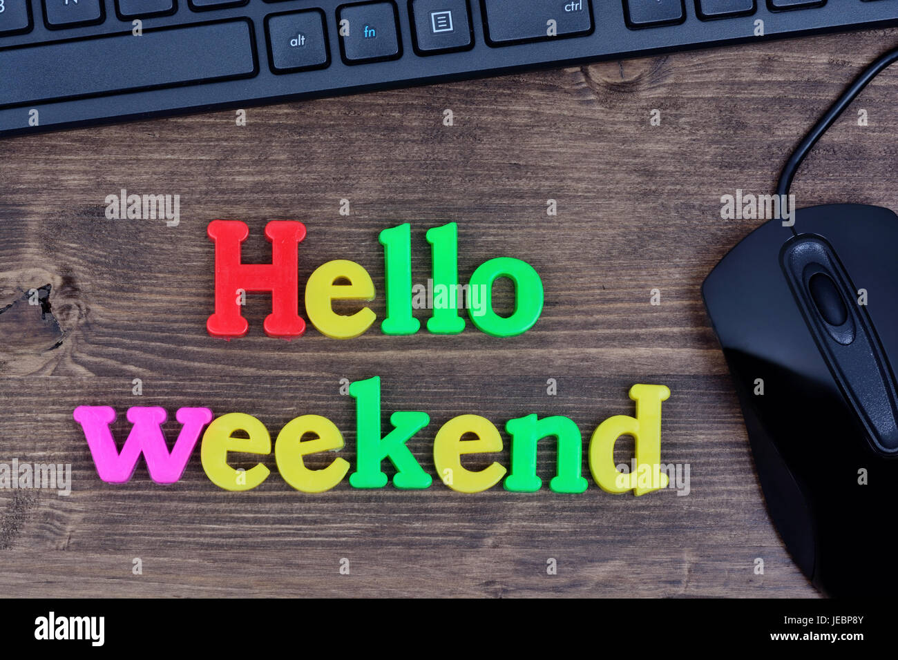 Hello weekend words on wooden table Stock Photo - Alamy