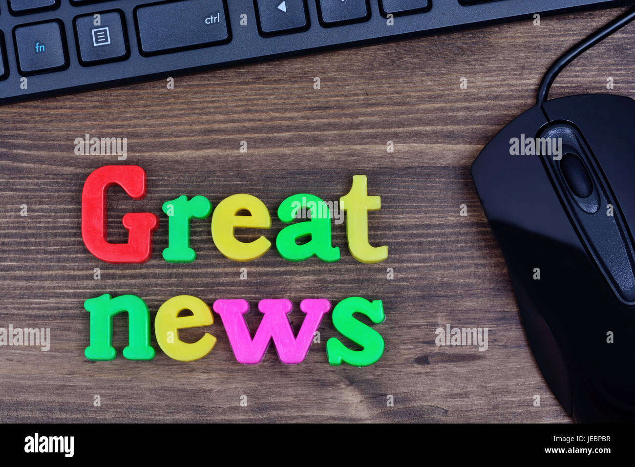Great news words on wooden table Stock Photo - Alamy