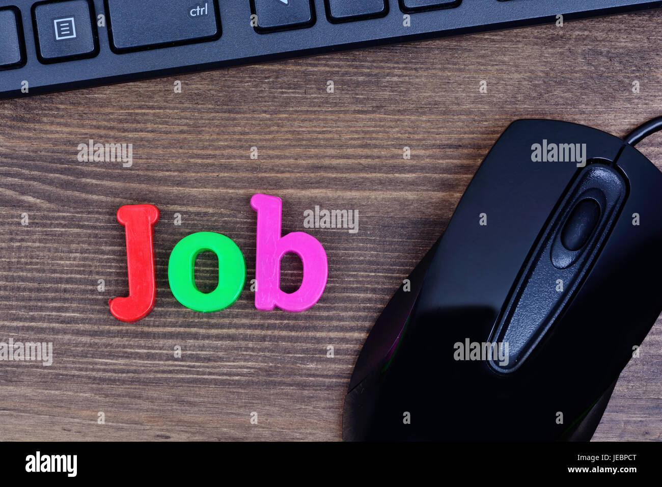 Job word on wooden table Stock Photo - Alamy