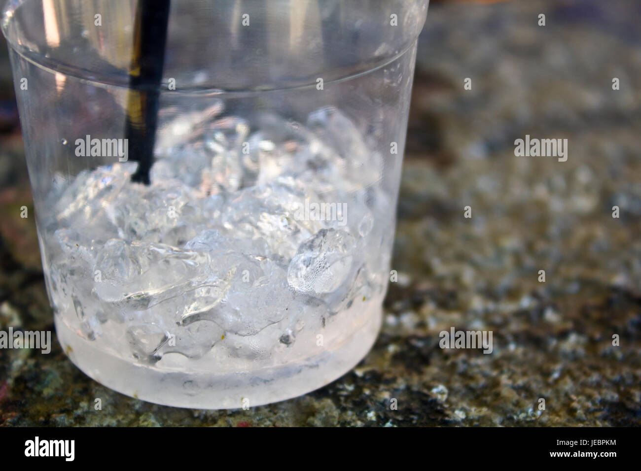 Plastic cup with ice Stock Photo - Alamy