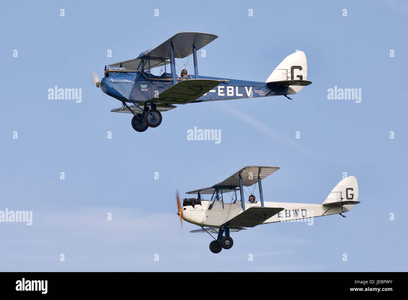 1925 DH60 Cirrus Moth flying with a DH60X Moth Stock Photo - Alamy