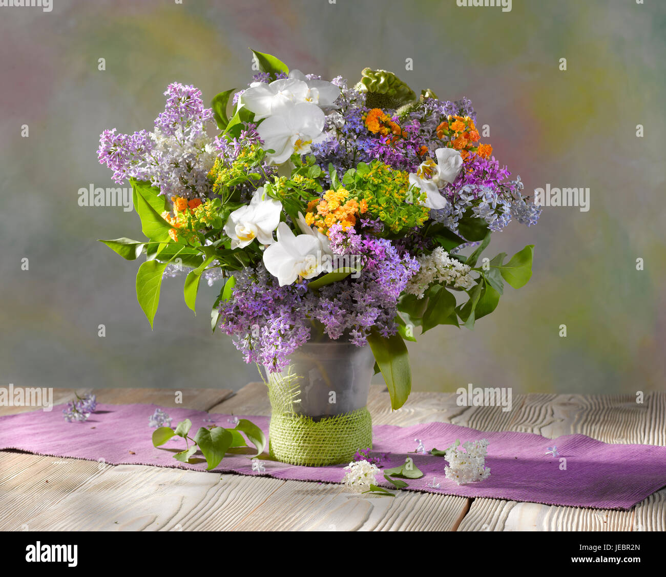 Bouquet of flowers with orchids and lilacs Stock Photo - Alamy