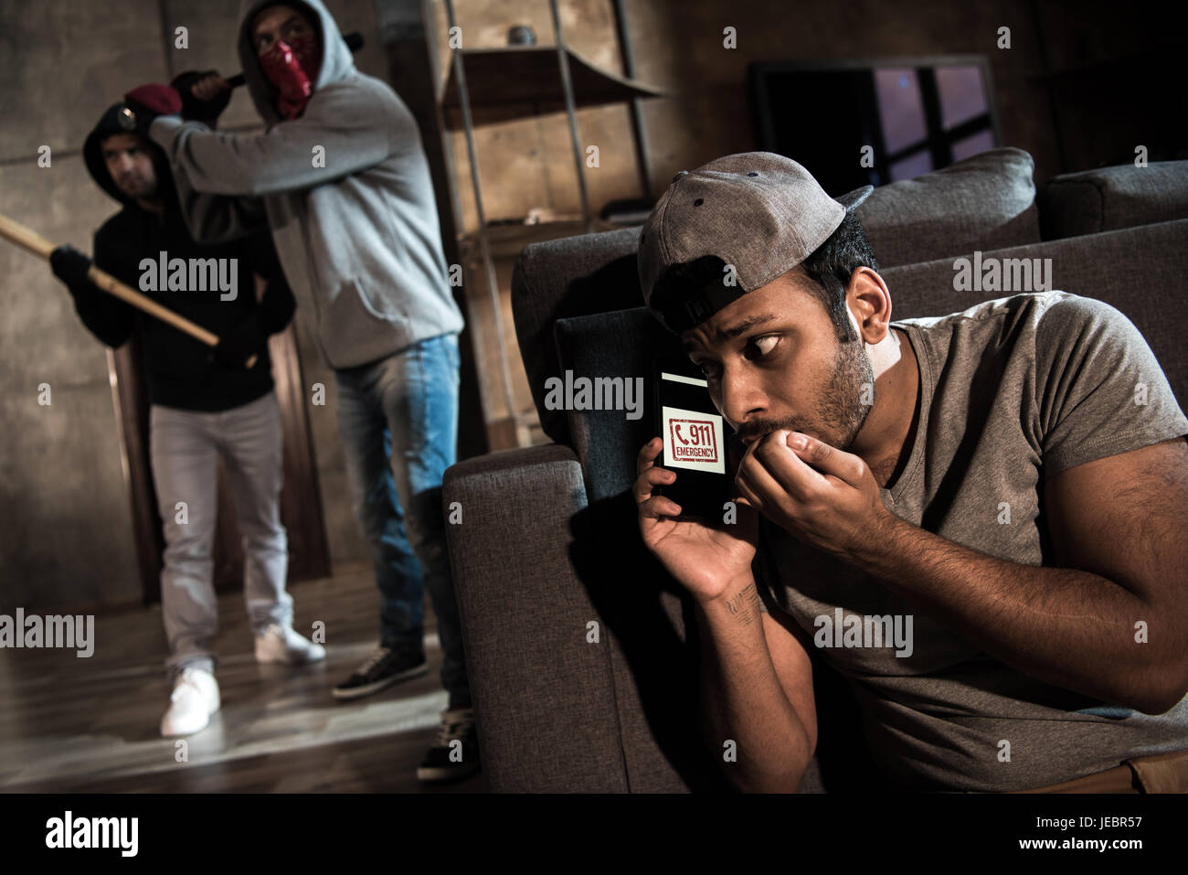 Scared man hiding from robbers and calling 911, House robbery scene ...