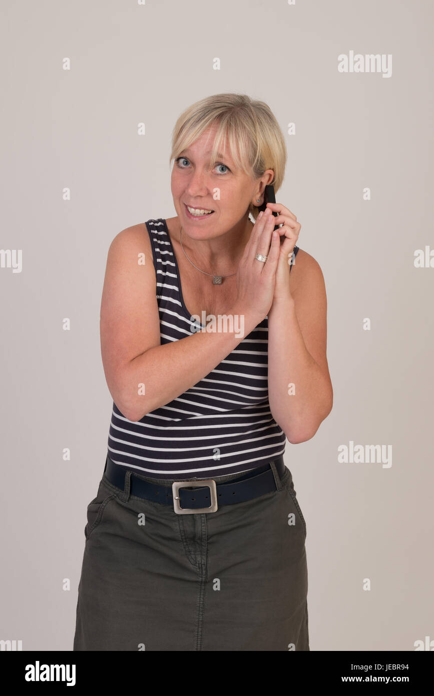 portrait of a attractive blond haired mid aged european woman wearing ...