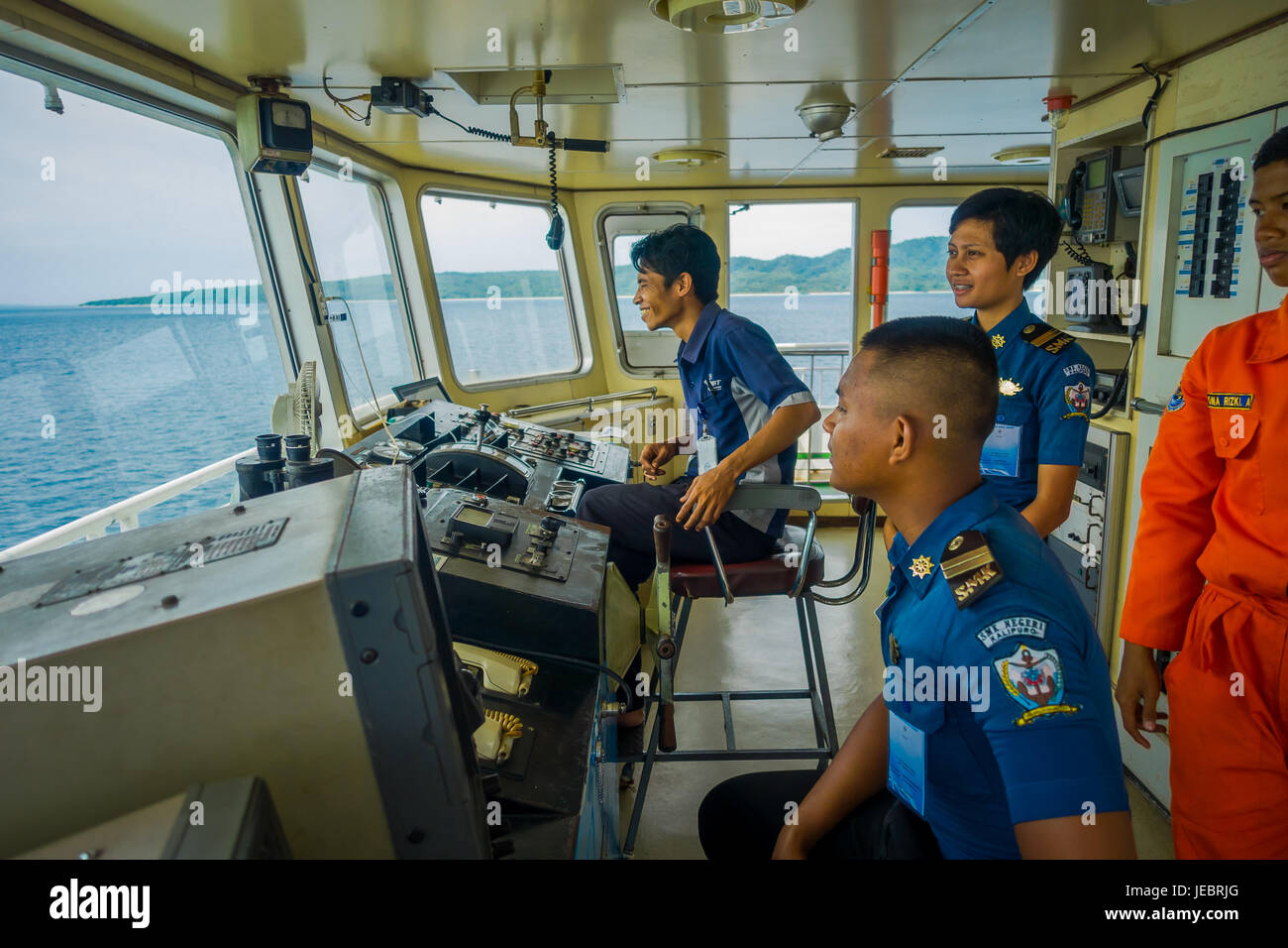 BALI, INDONESIA - APRIL 05, 2017: Ferry boat pilot command cabin with ...