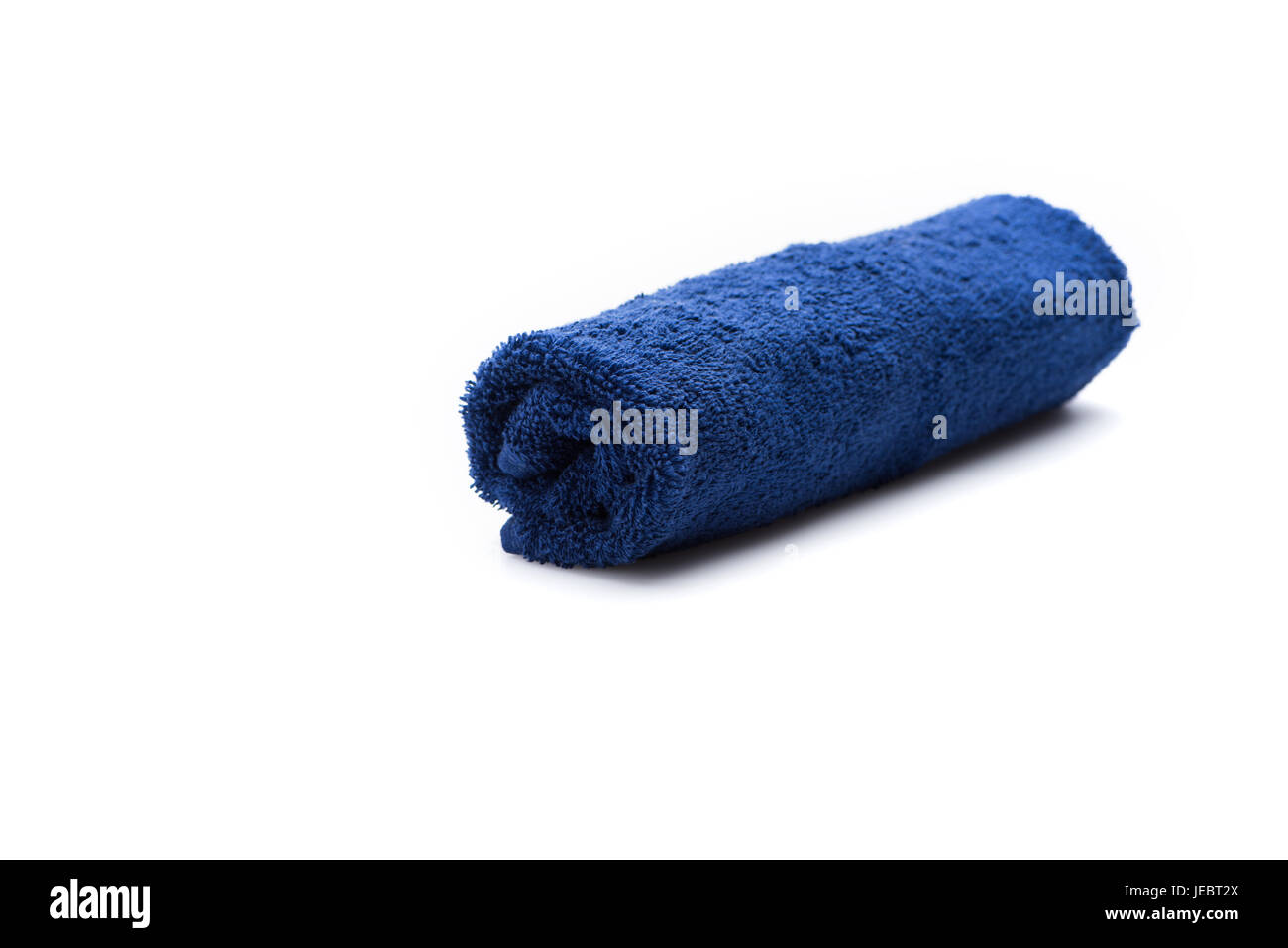 blue towel isolated on white. healthy living concept Stock Photo - Alamy