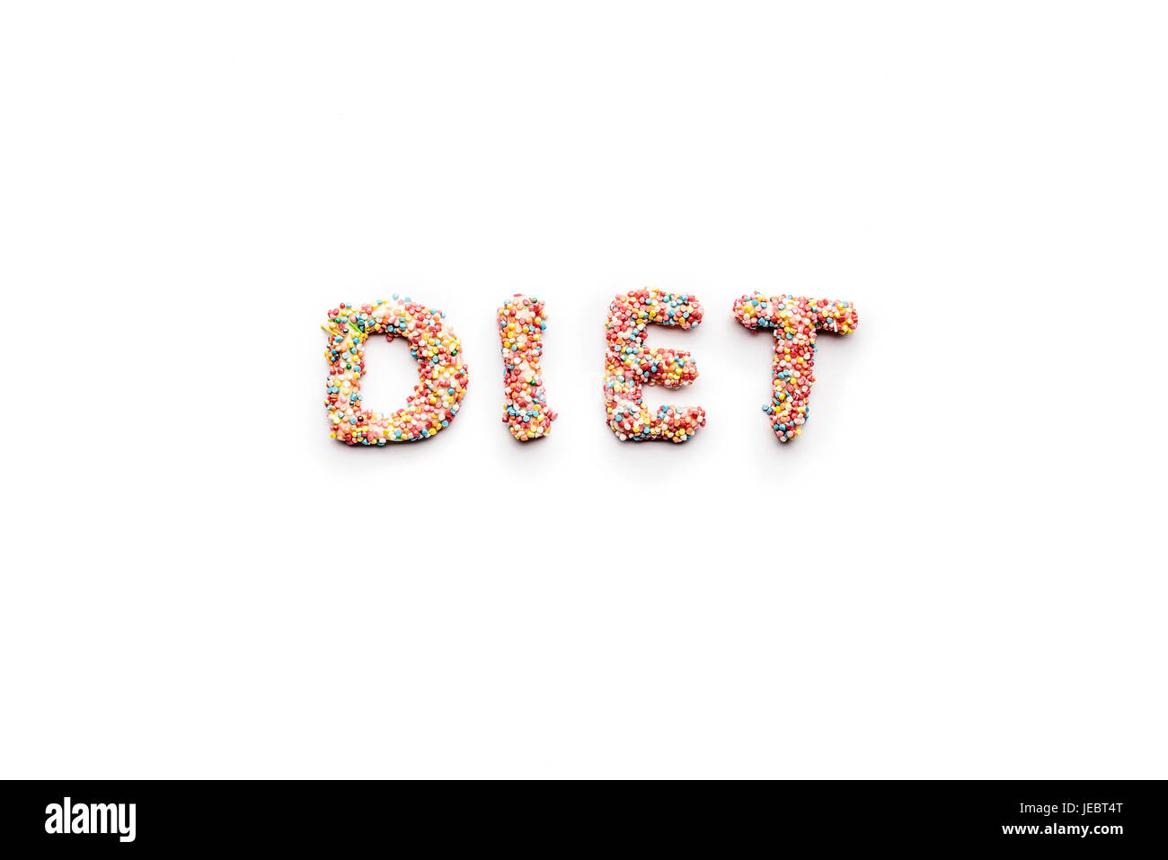 Top view of word diet made from sweets isolated on white, healthy ...