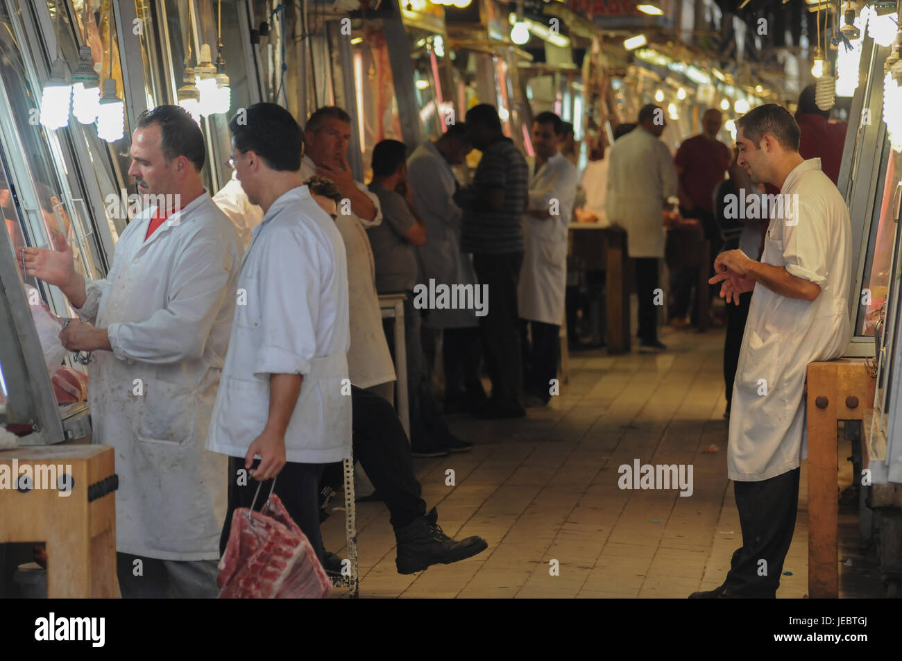 Greek butchers at work in Monastiraki covered market, Athens Stock ...