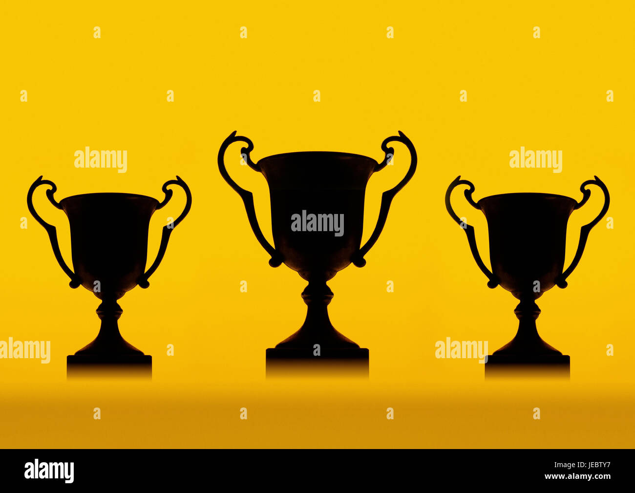 Cups, three trophies Stock Photo - Alamy