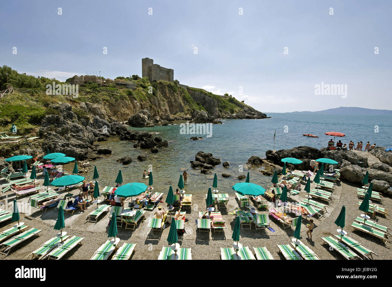 Italy, Tuscany, La Maremma, Talamone, sun benches on the beach Stock ...