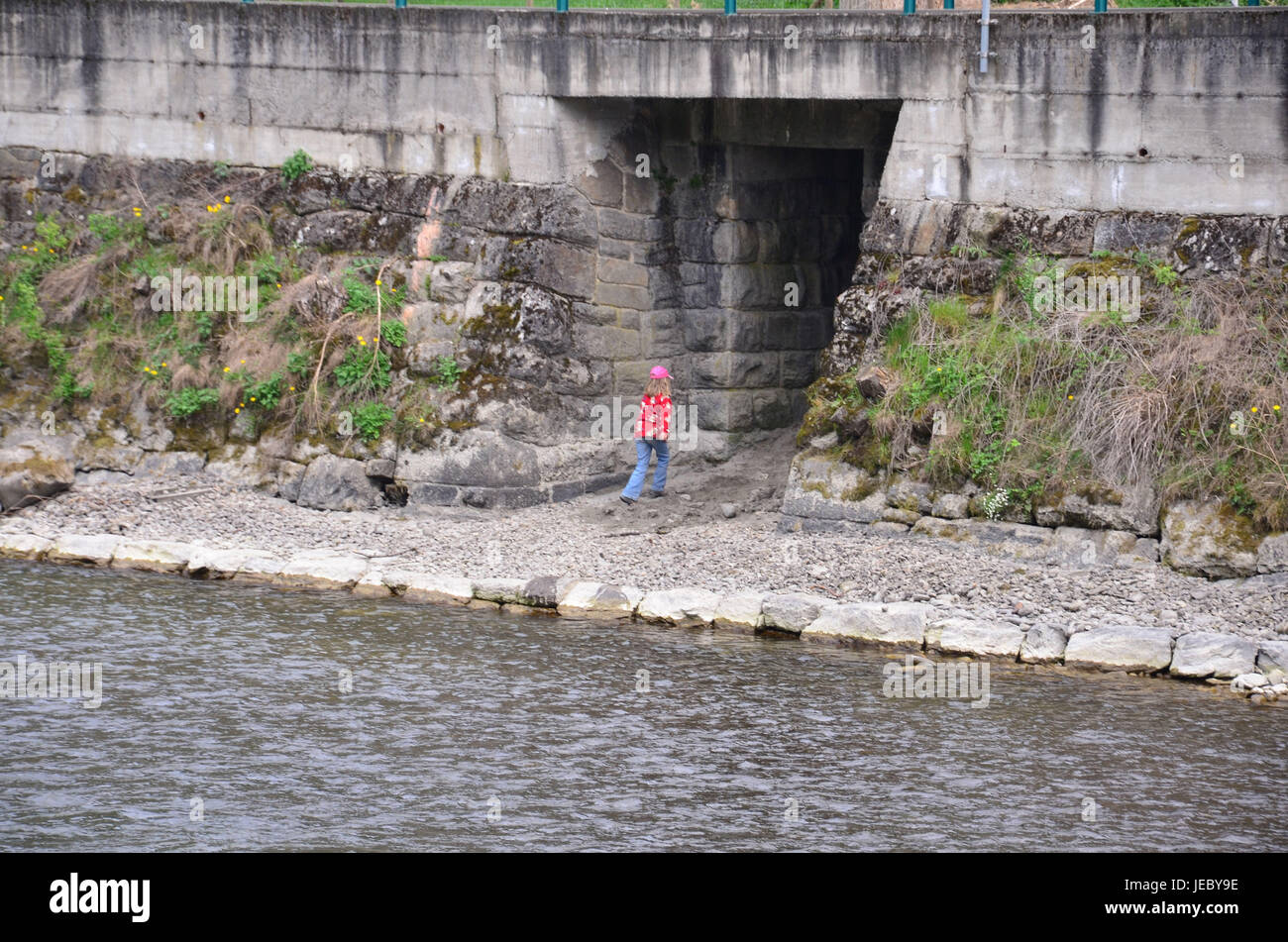 Danger, infant, underpass, riverside Stock Photo - Alamy
